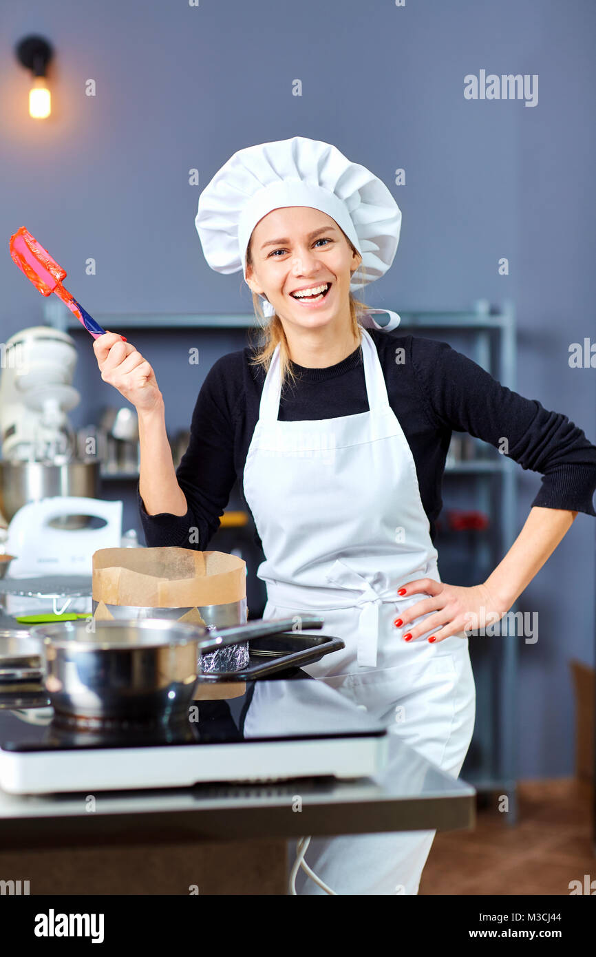 Chef woman on a kitchen Stock Photo - Alamy