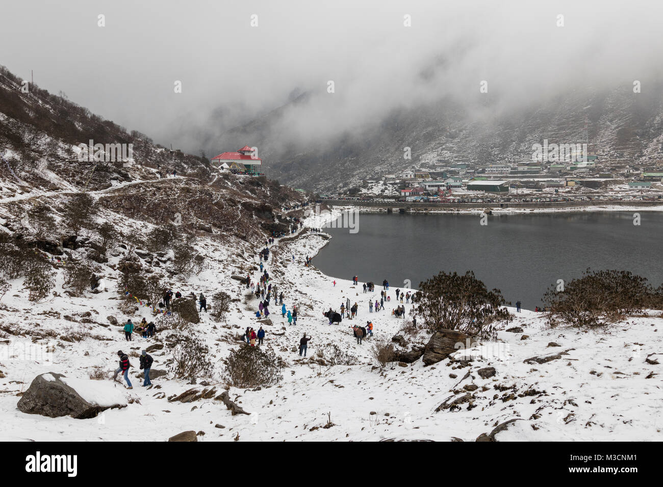 SIKKIM, INDIA, March 9 2017: Tourists at the Tsomgo (Changu) Lake in ...