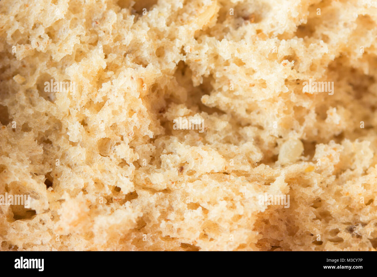 A slice of brown bread close up Stock Photo - Alamy