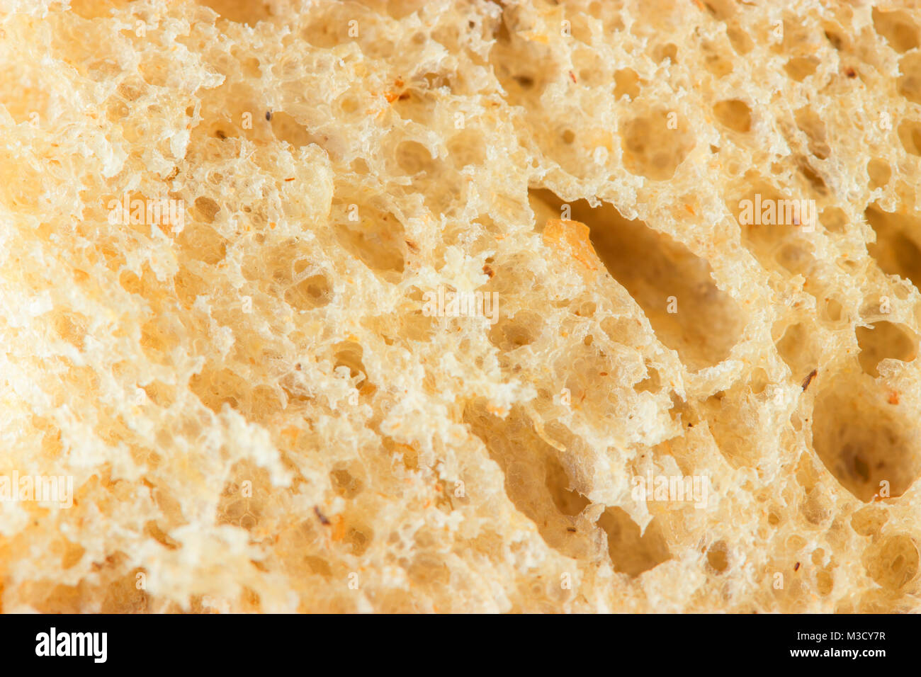 A slice of brown bread close up Stock Photo - Alamy