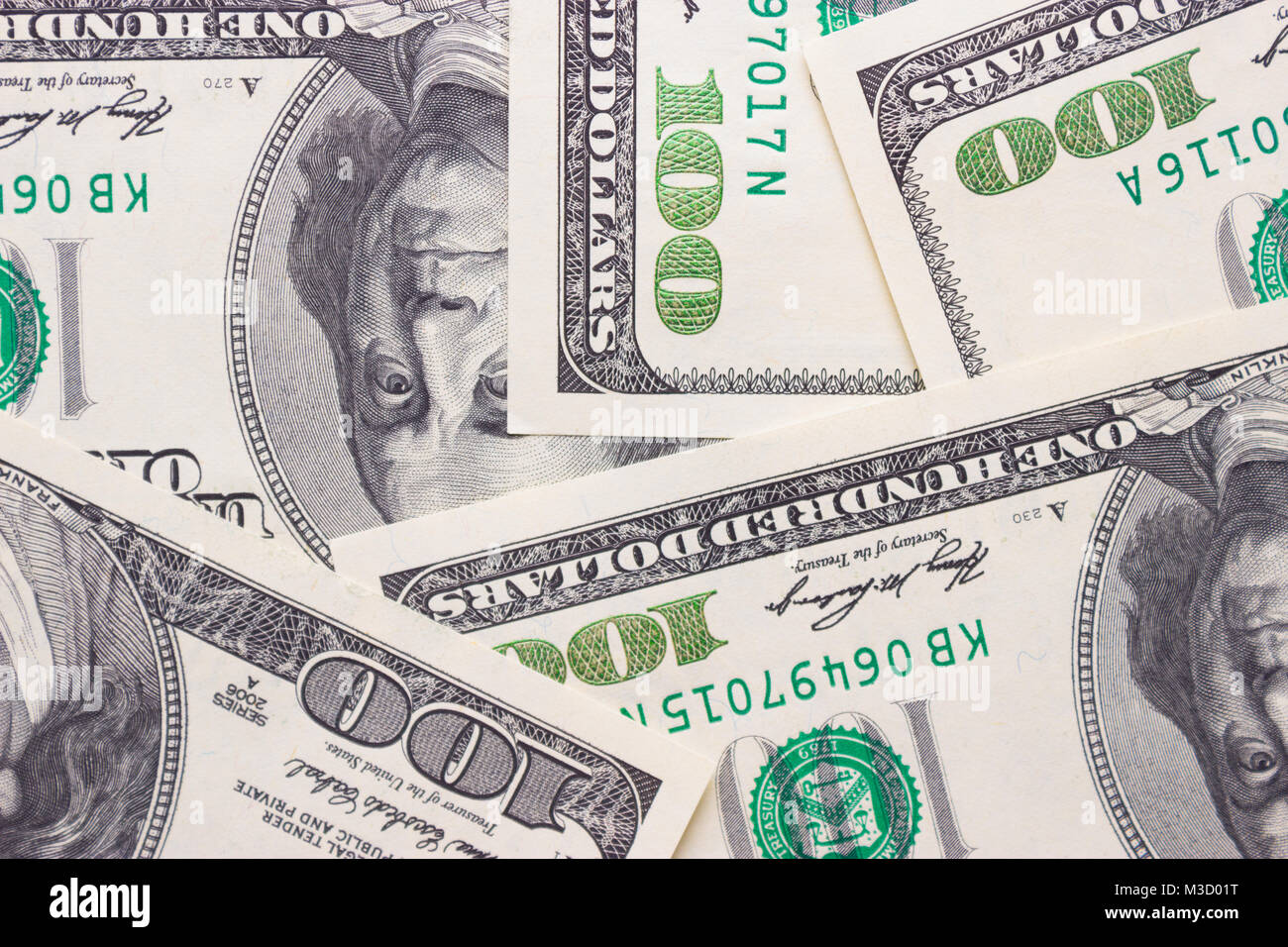 Background of 100 dollar bills on a table Stock Photo - Alamy