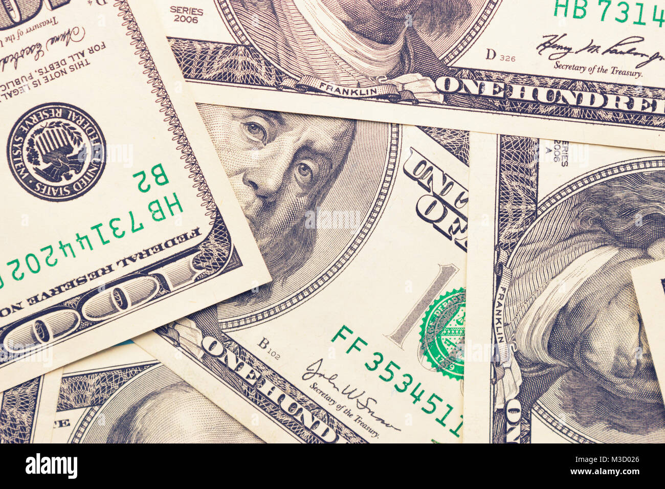 Background of 100 dollar bills on a table Stock Photo - Alamy