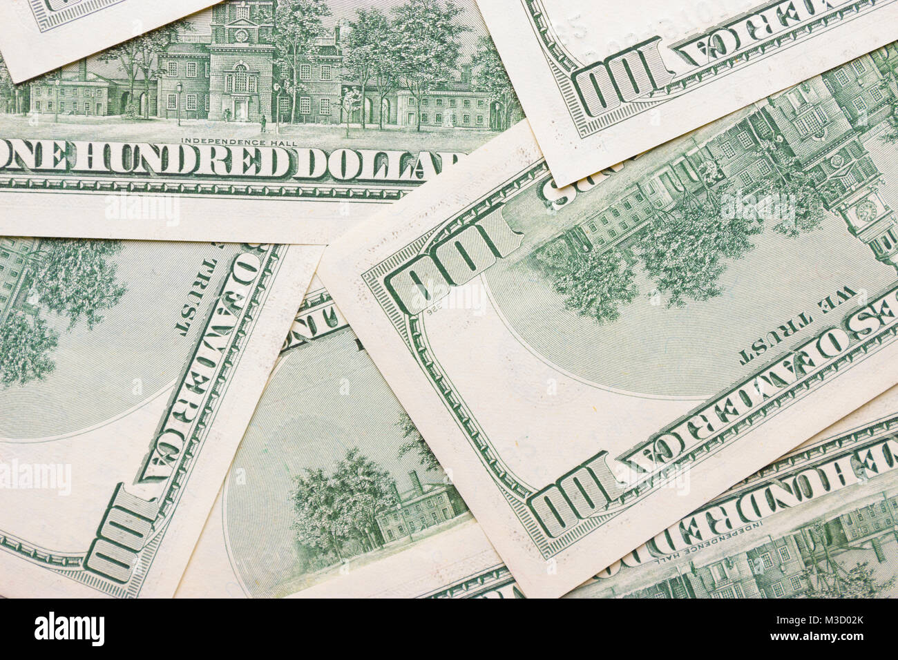 Background of 100 dollar bills on a table Stock Photo - Alamy
