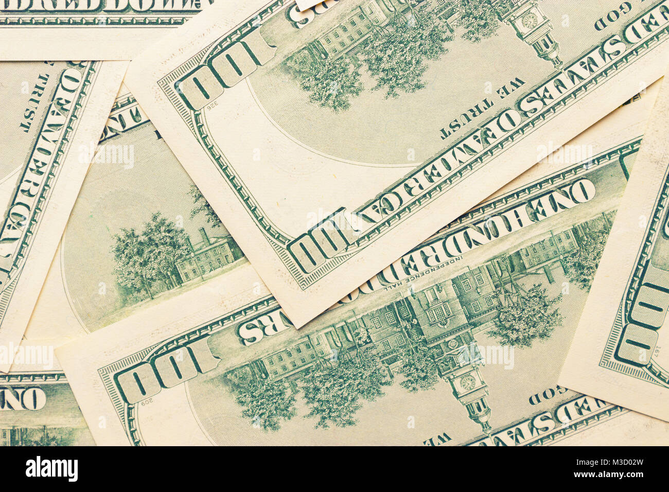 Background of 100 dollar bills on a table Stock Photo - Alamy