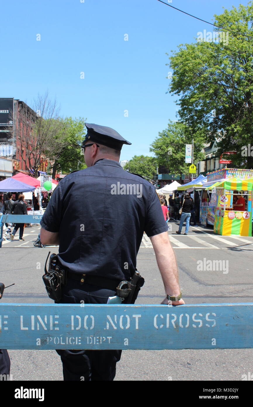 cops form the NYPD new york police department relax at a street fair in ...