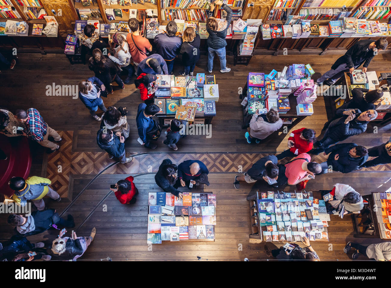 Visitors in one of the most famous bookstores in the world - Livraria ...
