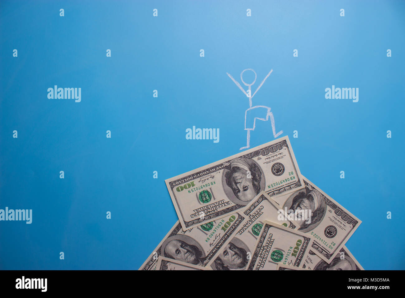 man standing on the dollars in a shape of a mountain. earn money ...