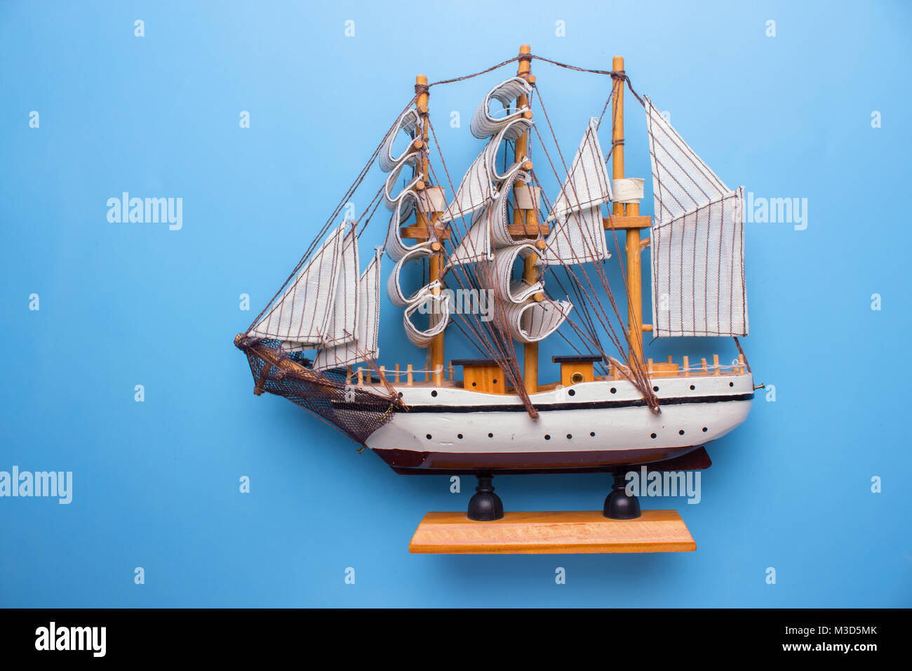 ship model on blue bacground. close up Stock Photo - Alamy