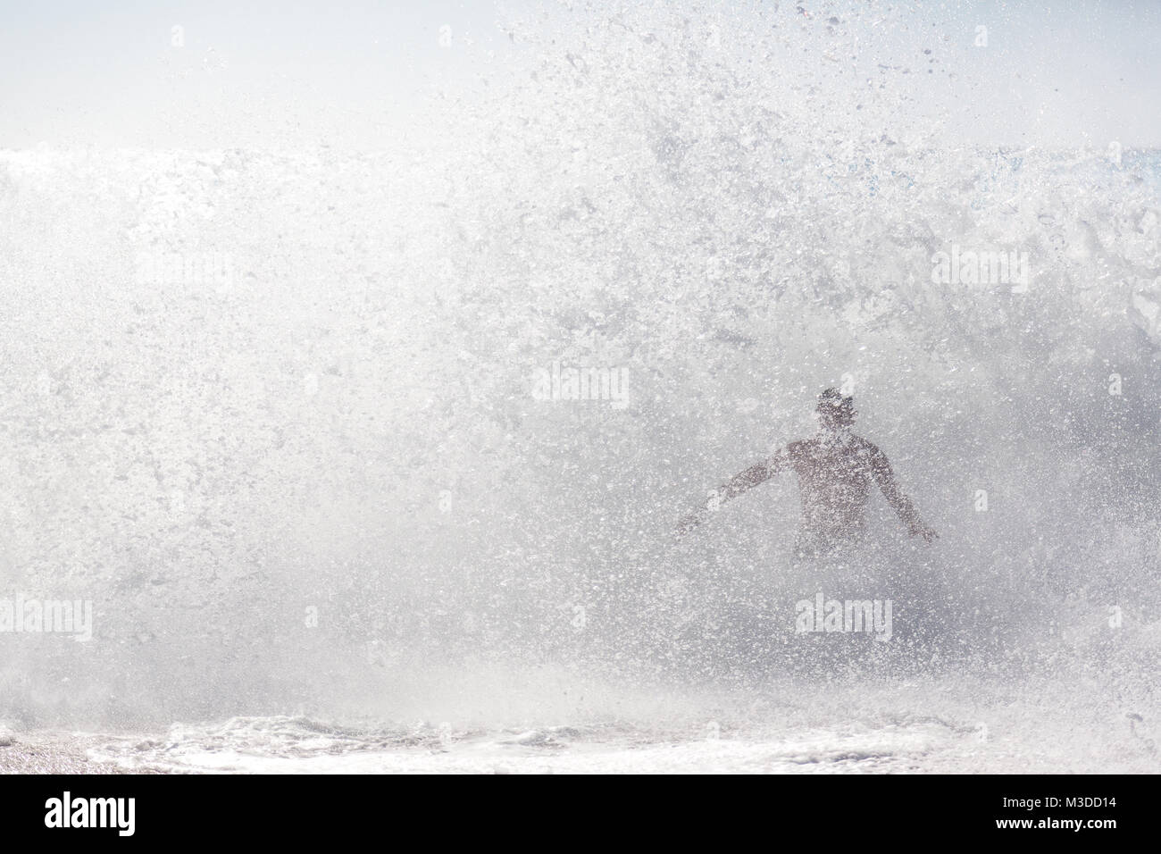 Heavy waves with person Stock Photo - Alamy