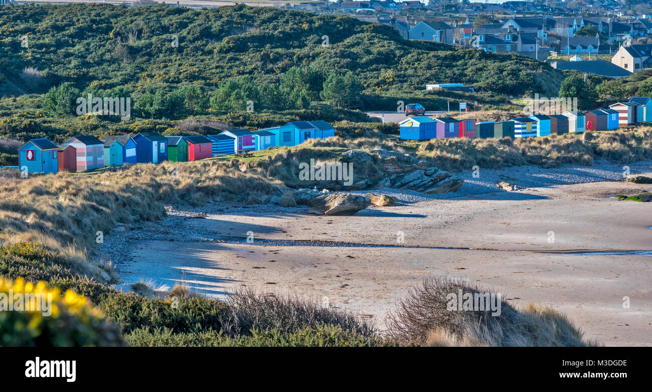 HOPEMAN MORAY SCOTLAND LONG ROW OF COLOURED BEACH HUTS BELOW THE ...
