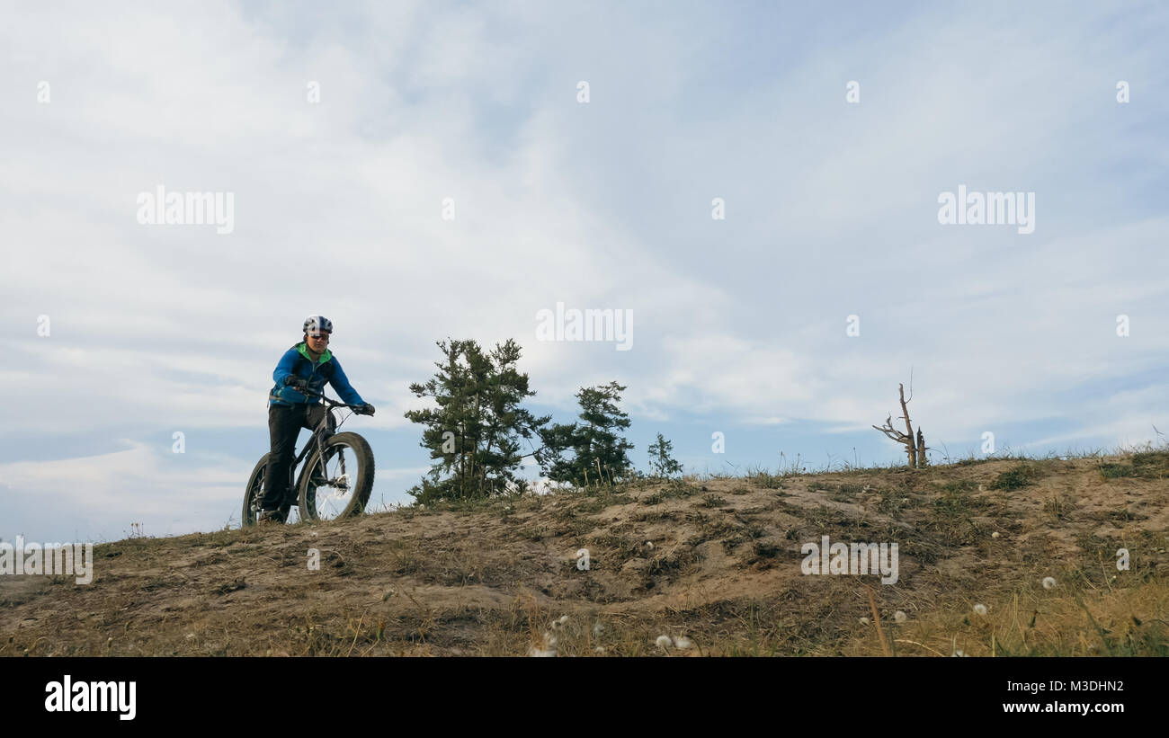 Fat bike also called fatbike or fat-tire bike in summer driving the ...