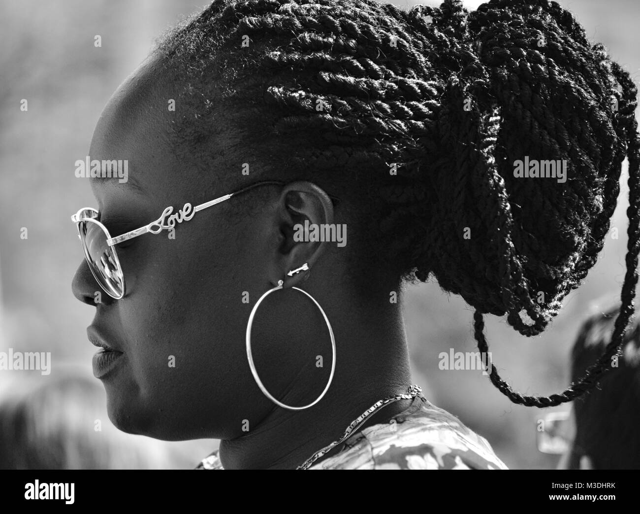 Black and White side profile of African American woman with braids and ...