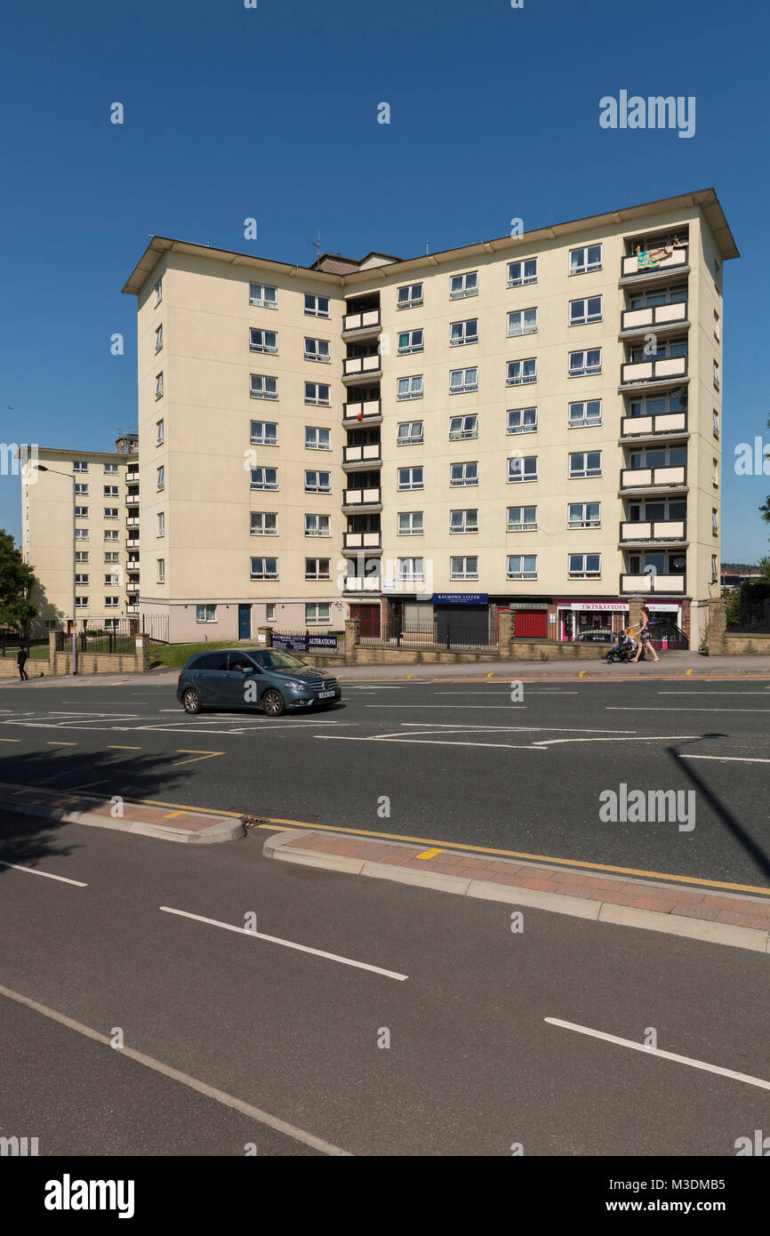 White-painted Newcastle House flats stand out against blue sky (city ...