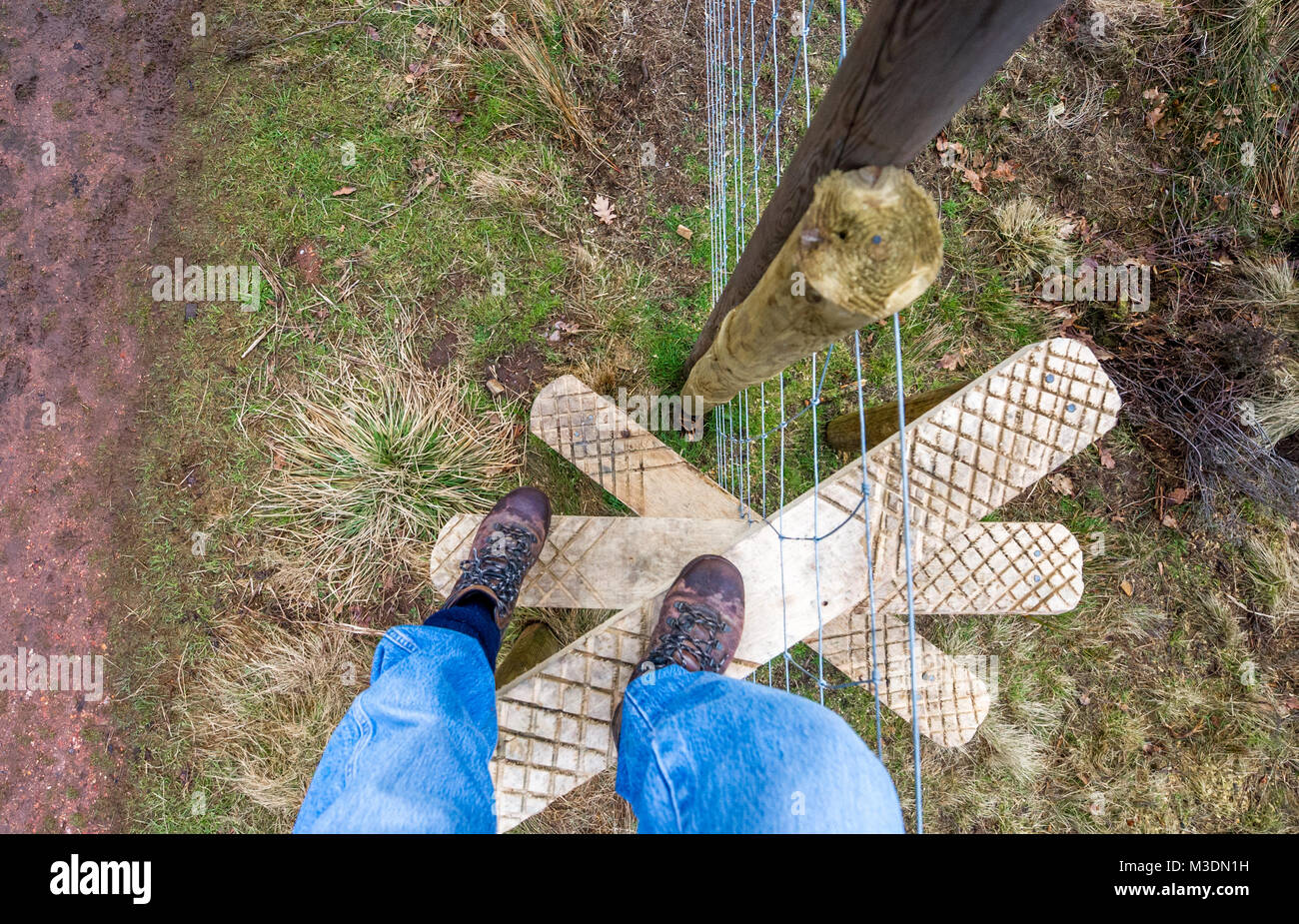 Step over fence hi-res stock photography and images - Alamy