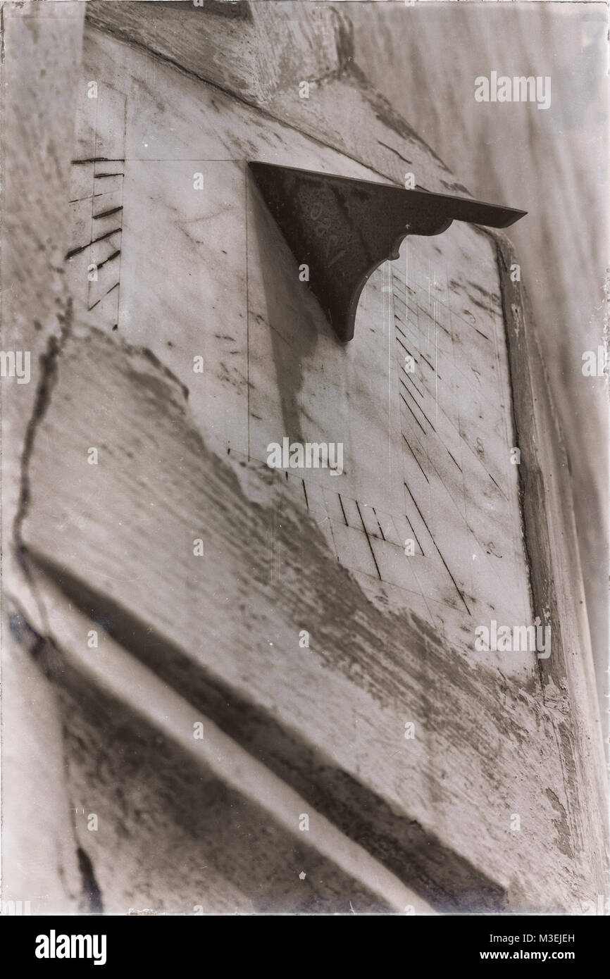 and the gnomon in the antique broken wall Stock Photo - Alamy