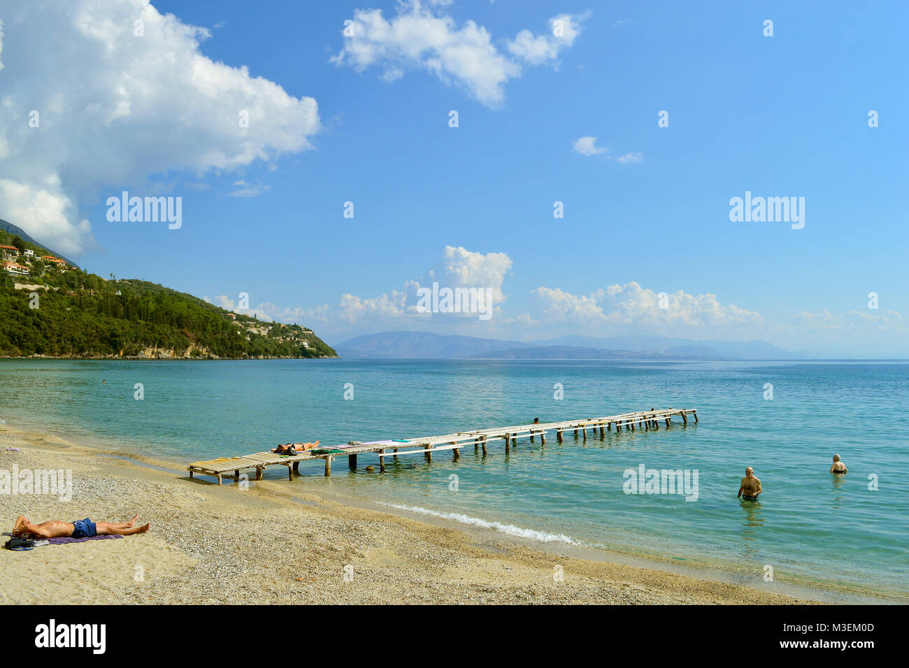 Ipsos Beach pier in Corfu a Greek island in the Ionian sea Stock Photo ...