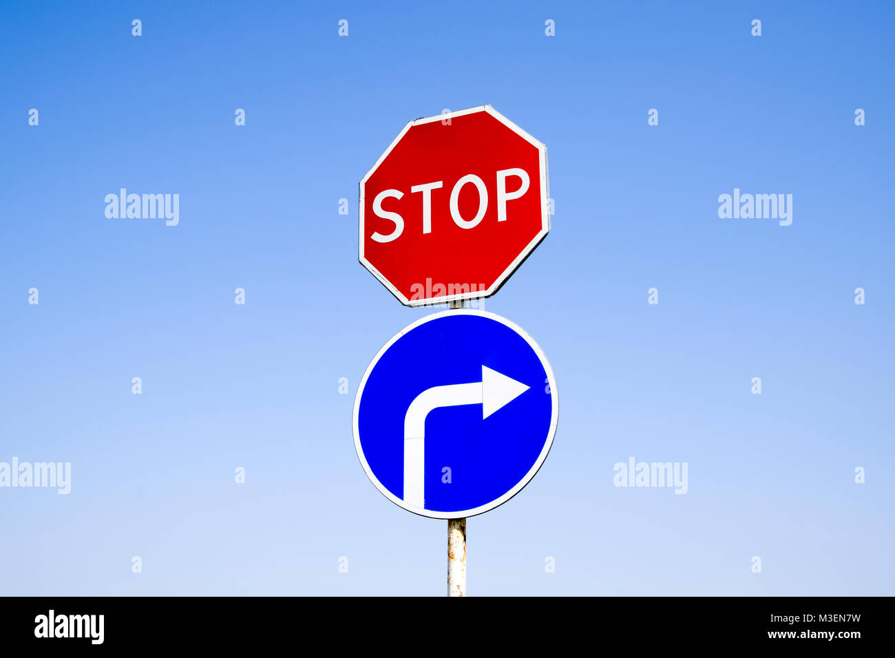 The road sign is stop. sign turn right Stock Photo - Alamy