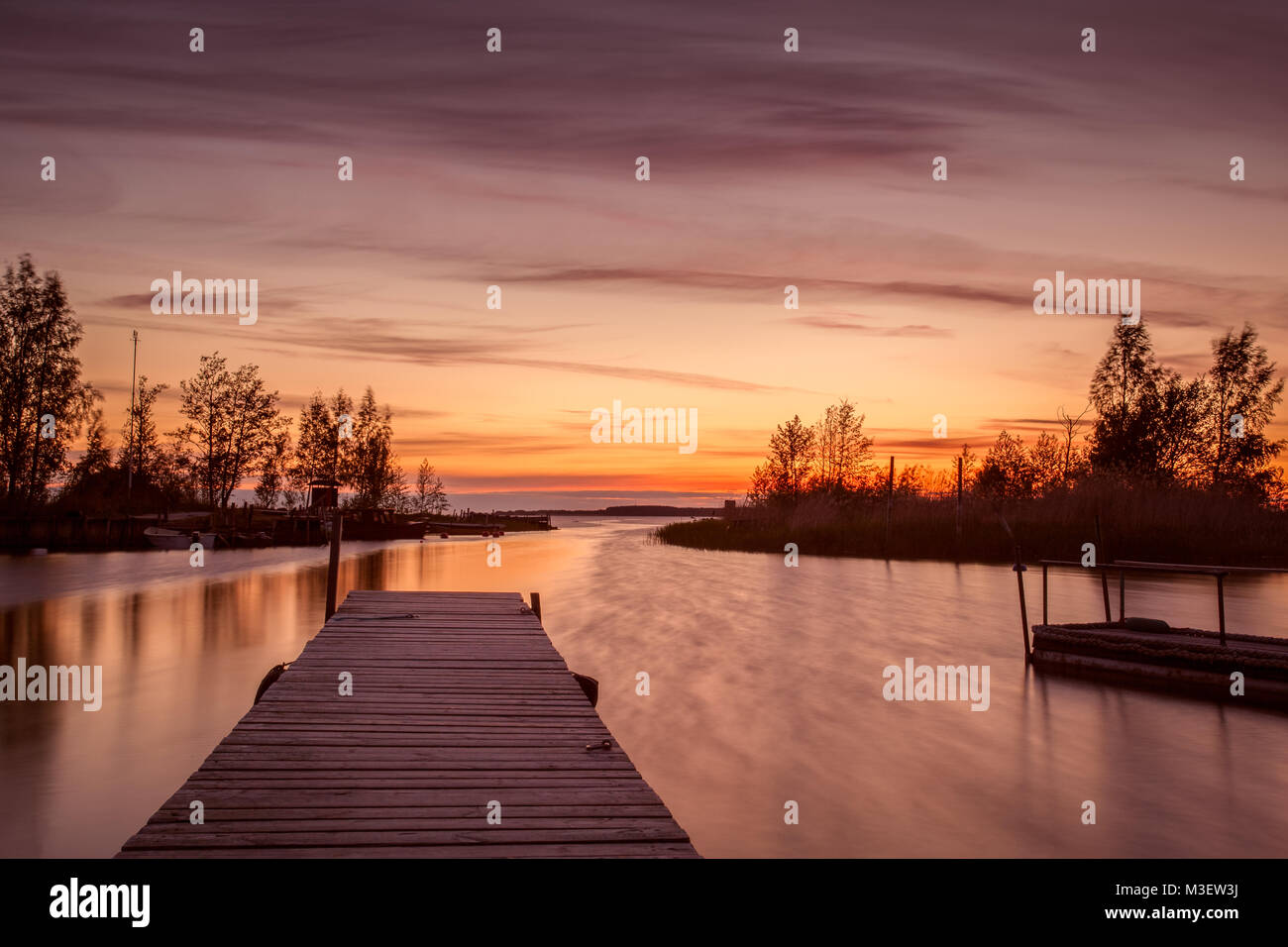 Dock sunset hi-res stock photography and images - Alamy