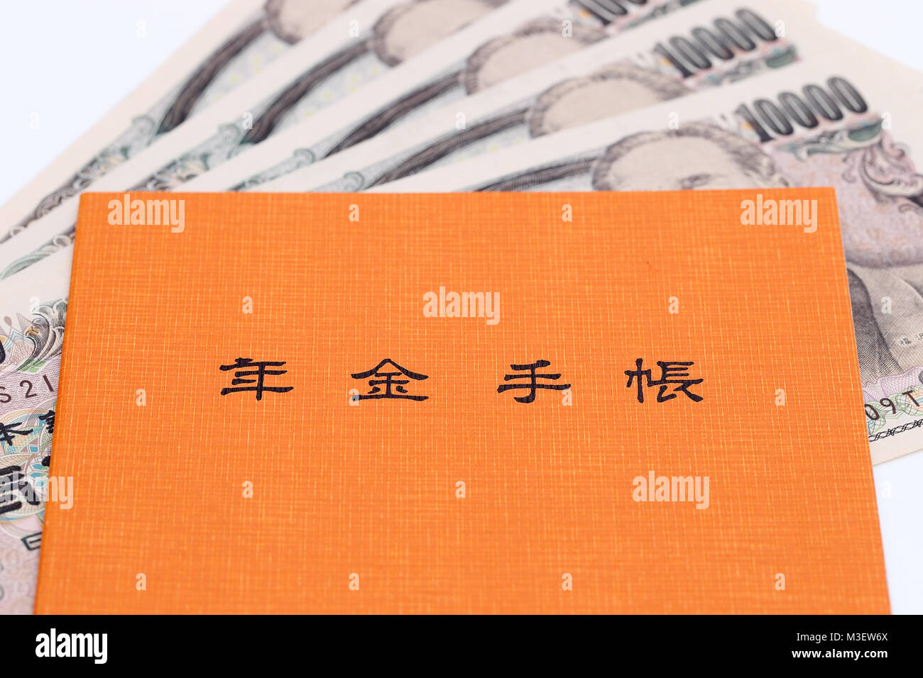 Japanese national pension plan handbook on white background Stock Photo ...
