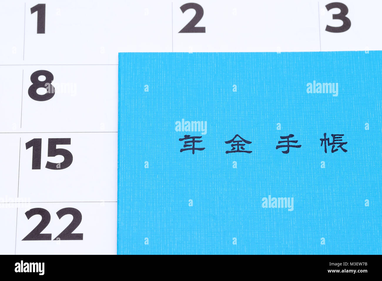 Japanese national pension plan handbook and money on calendar ...