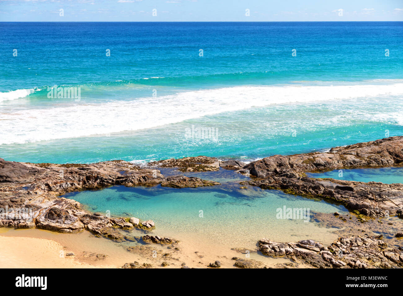 in australia fraser island the beach near the rocks in the wave of ...