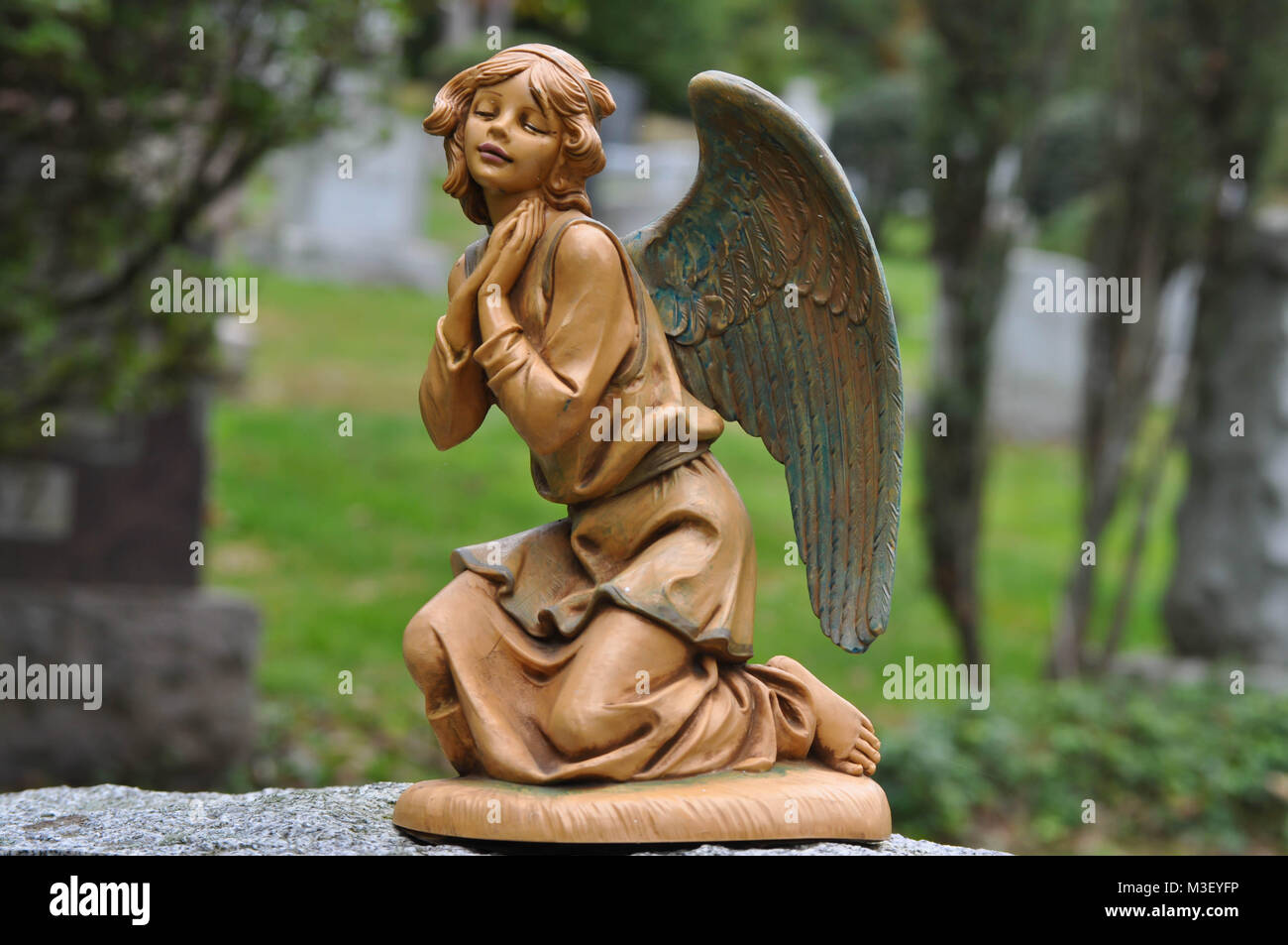 Angel Statue in a Catholic Cemetery Stock Photo - Alamy