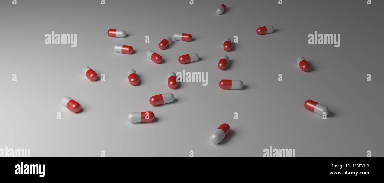 Scattered pills on a white surface Stock Photo - Alamy