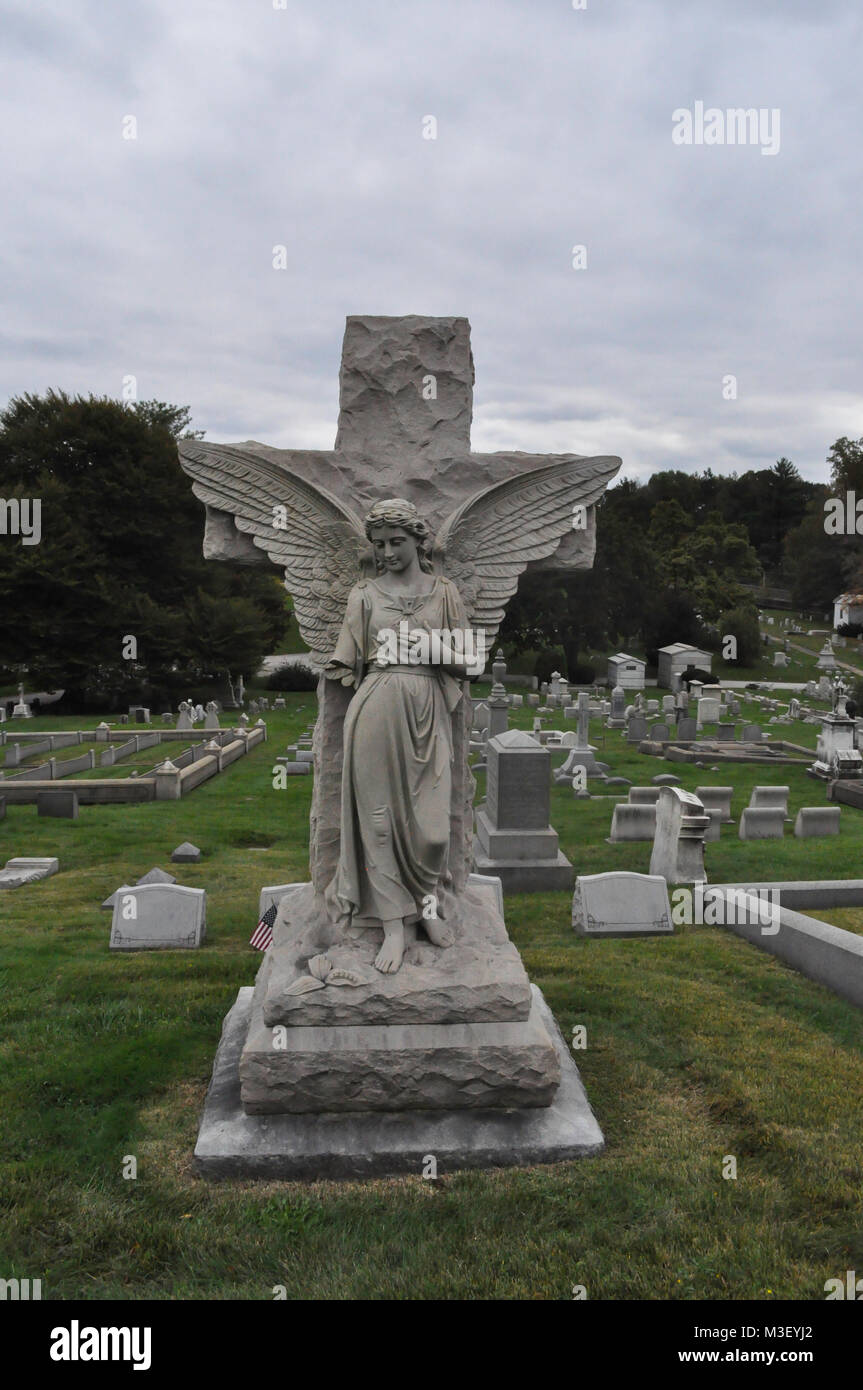 Angel Statue in a Catholic Cemetery Stock Photo - Alamy