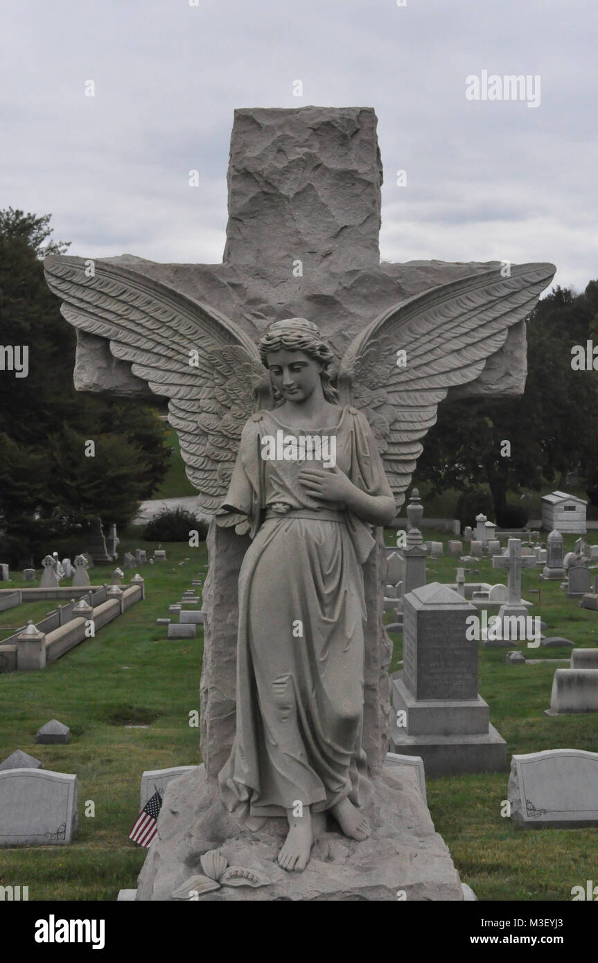 Angel Statue in a Catholic Cemetery Stock Photo - Alamy