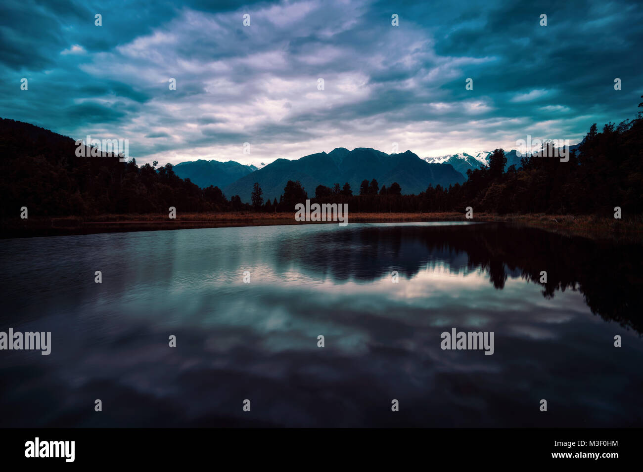 Sunset lake matheson southern alps hi-res stock photography and images ...