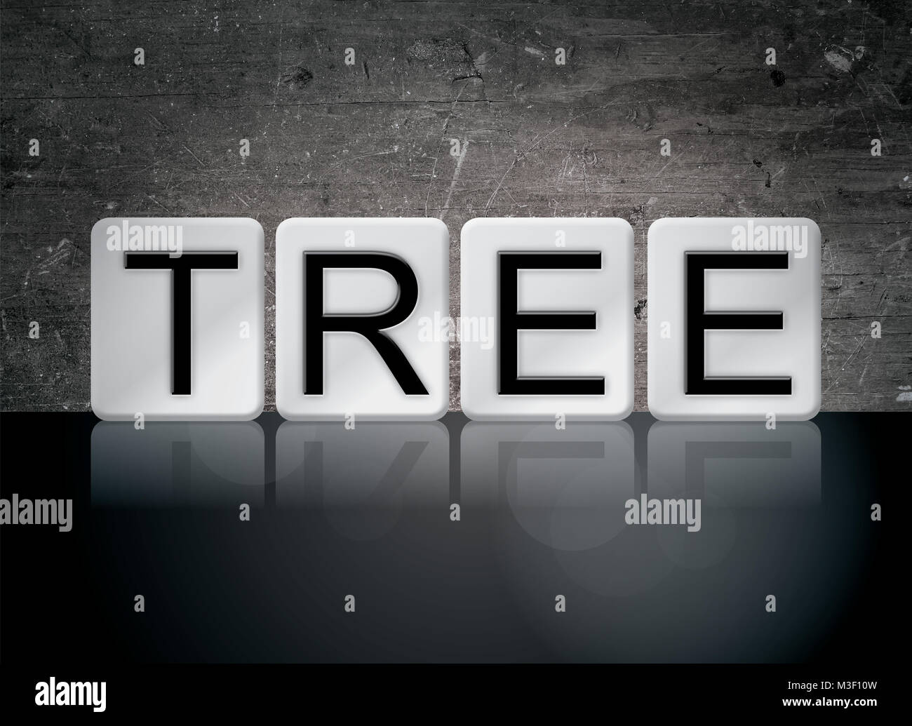 The word Tree concept and theme written in white tiles on a dark ...