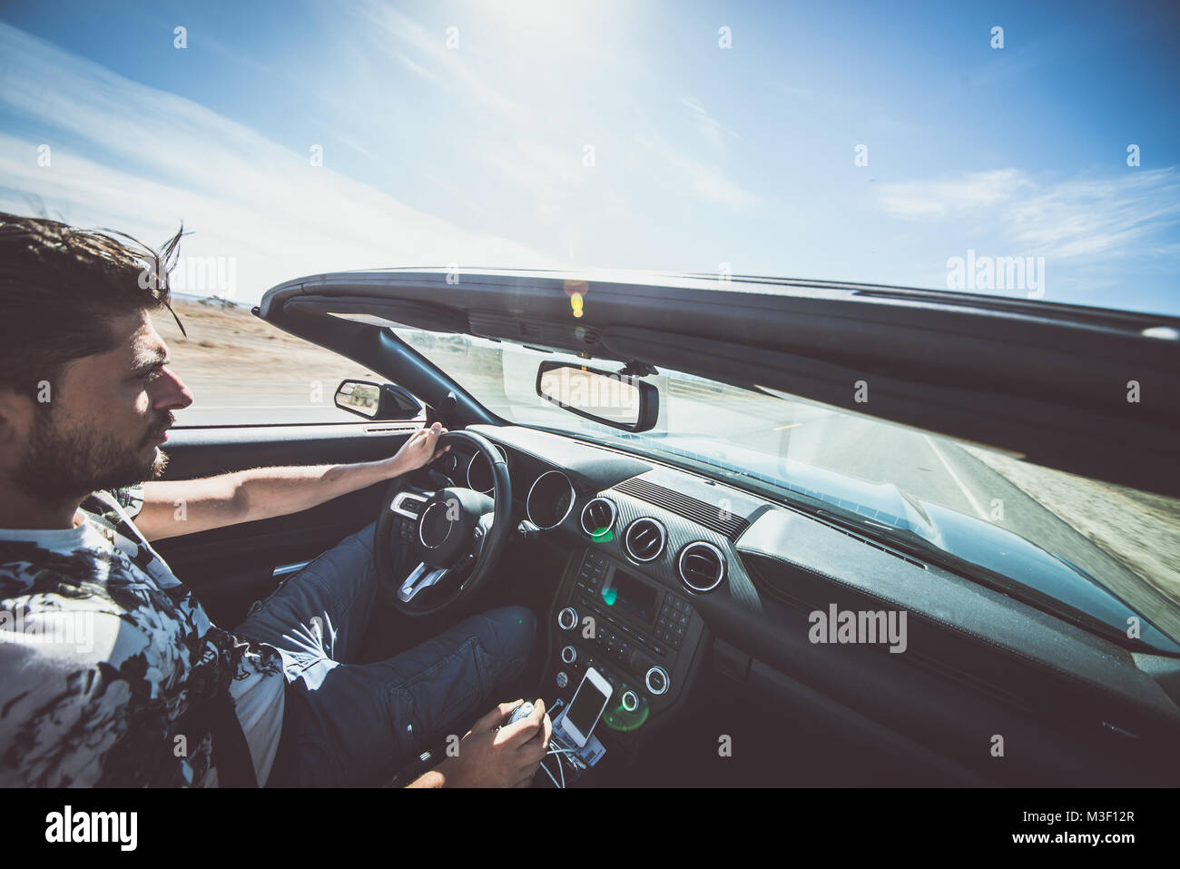 Man driving his sport car Stock Photo - Alamy