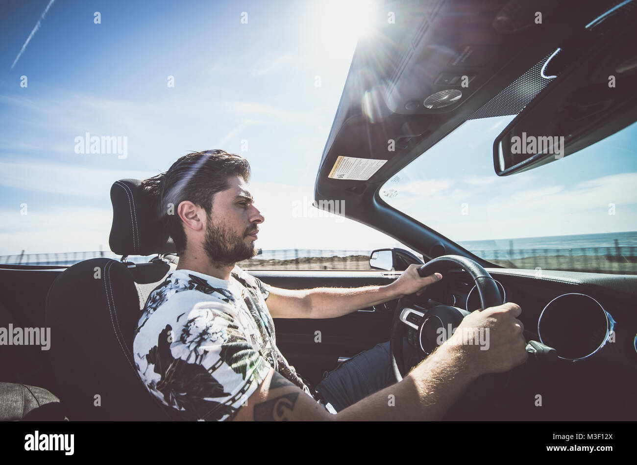 Man driving his sport car Stock Photo - Alamy