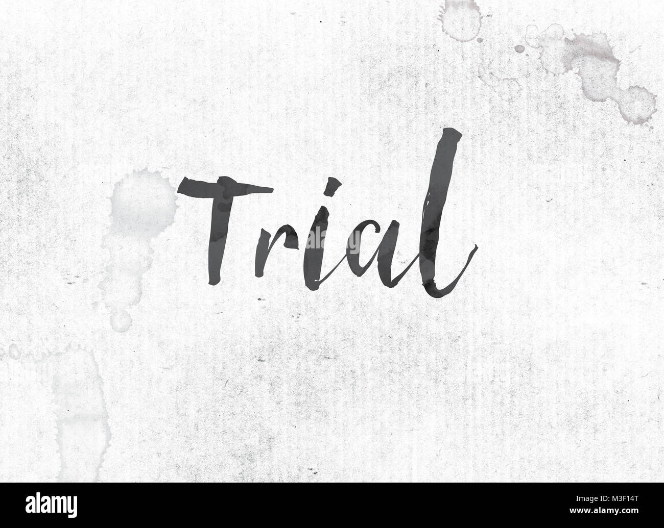 The Word Trial Concept And Theme Painted In Black Ink On A Watercolor the-word-trial-concept-and-theme-painted-in-black-ink-on-a-watercolor