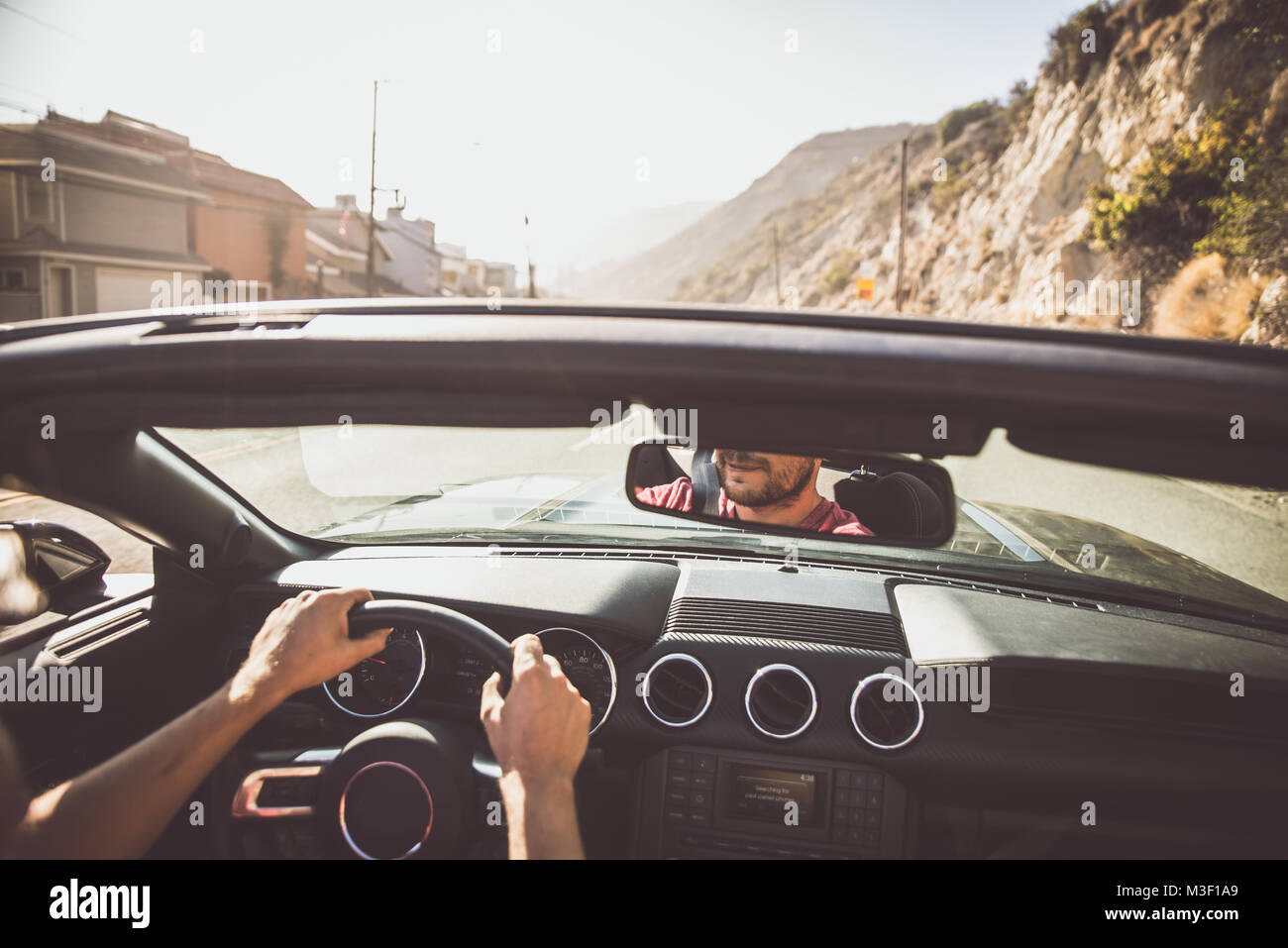 Man driving convertible car in Los angeles, santa monica Stock Photo ...