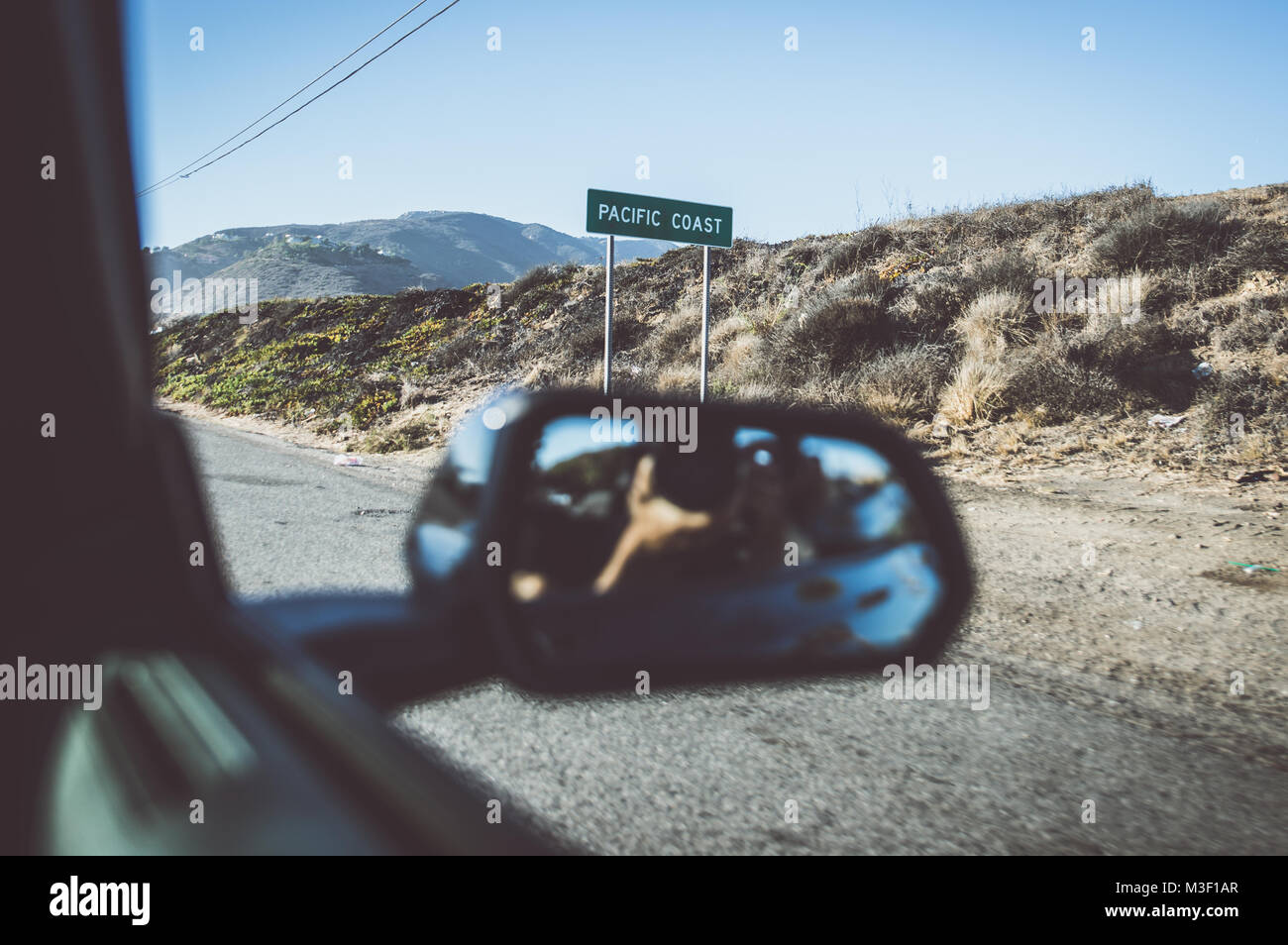 Man driving convertible car in Los angeles, santa monica Stock Photo ...