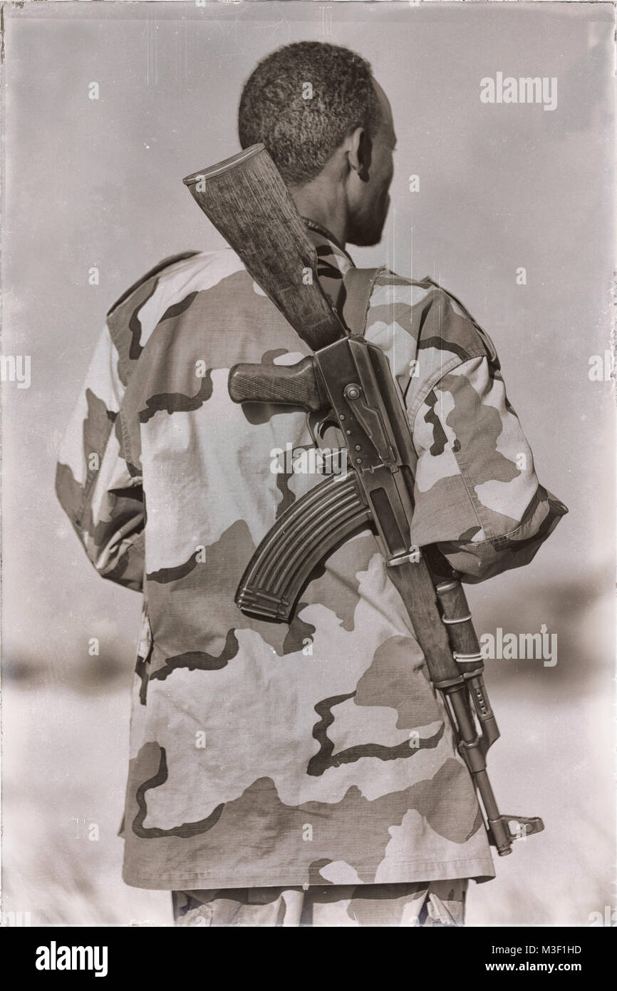 africa in the land of ethiopia a black soldier and his gun looking the ...