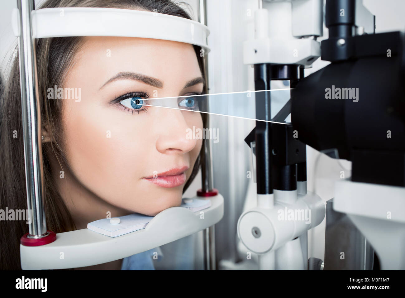 Checking eye hi-res stock photography and images - Alamy