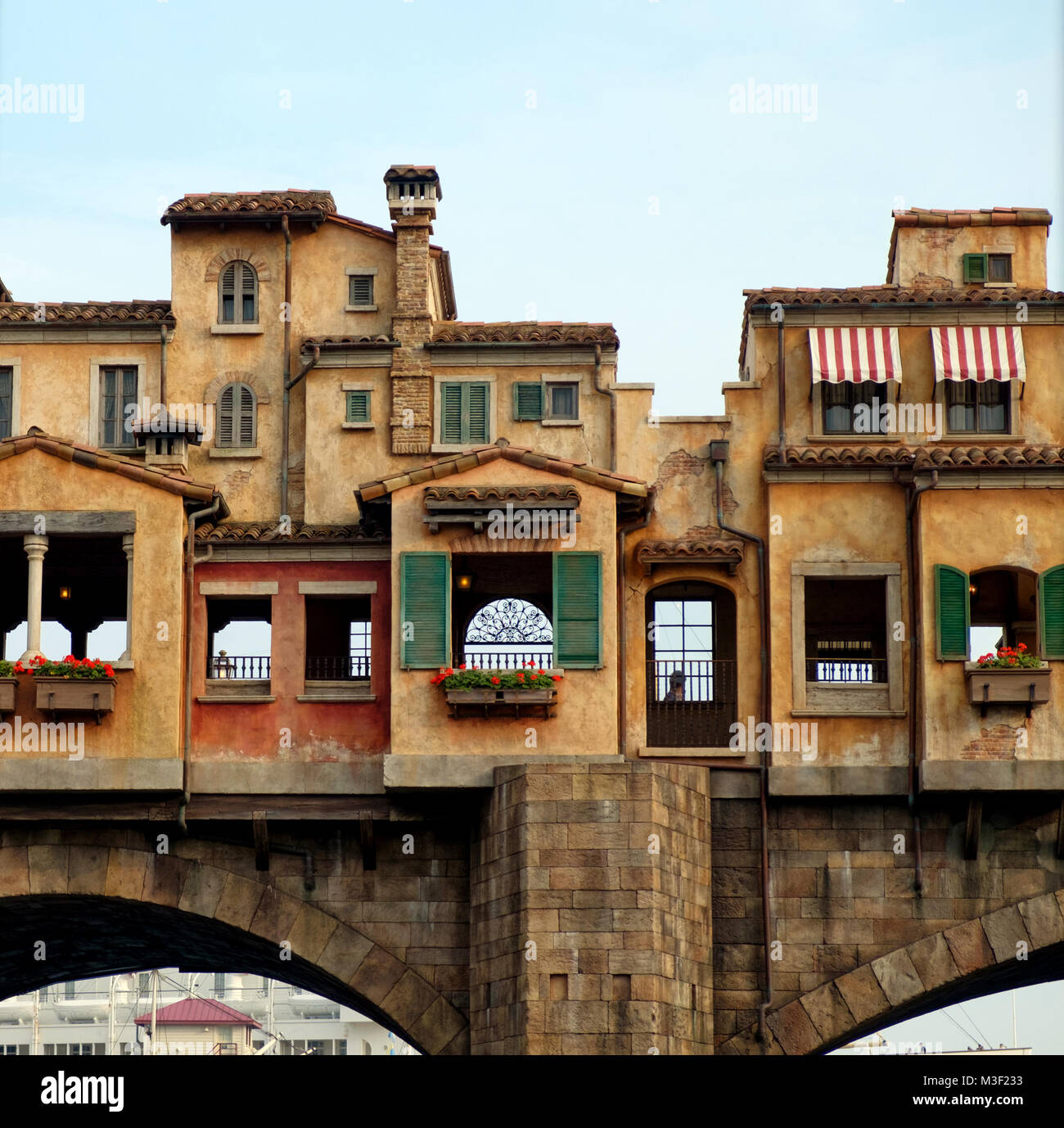 Italian style architecture. Weathered pale orange buildings with ...