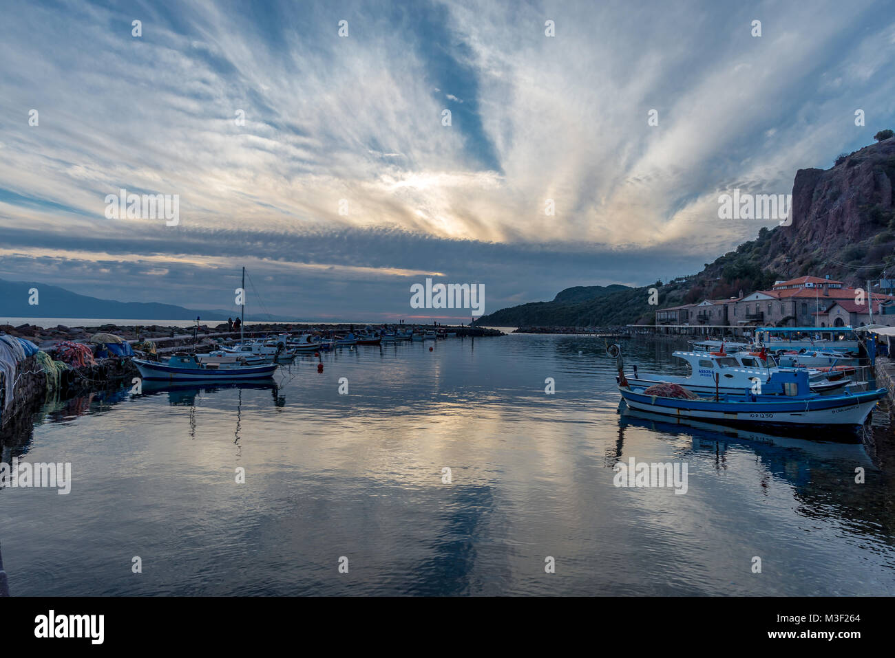 Sunset at Assos harbor, Behramkale, Canakkale Stock Photo - Alamy
