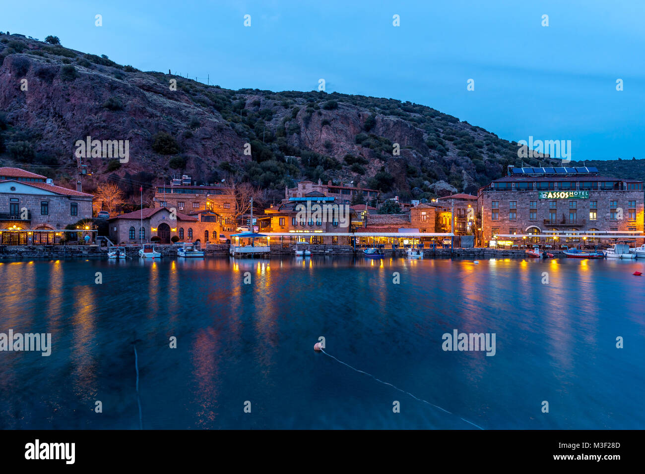 Sunset at Assos harbor, Behramkale, Canakkale Stock Photo - Alamy