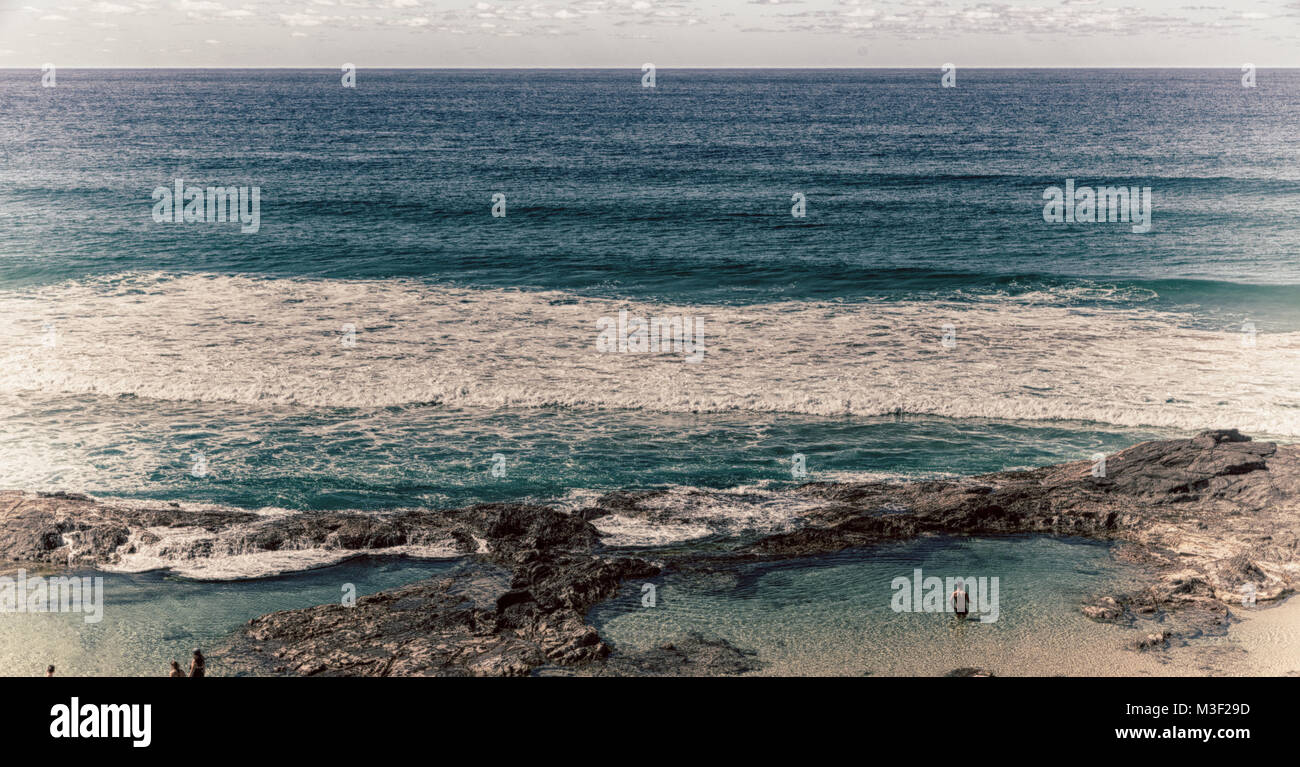 in australia fraser island the beach near the rocks in the wave of ...