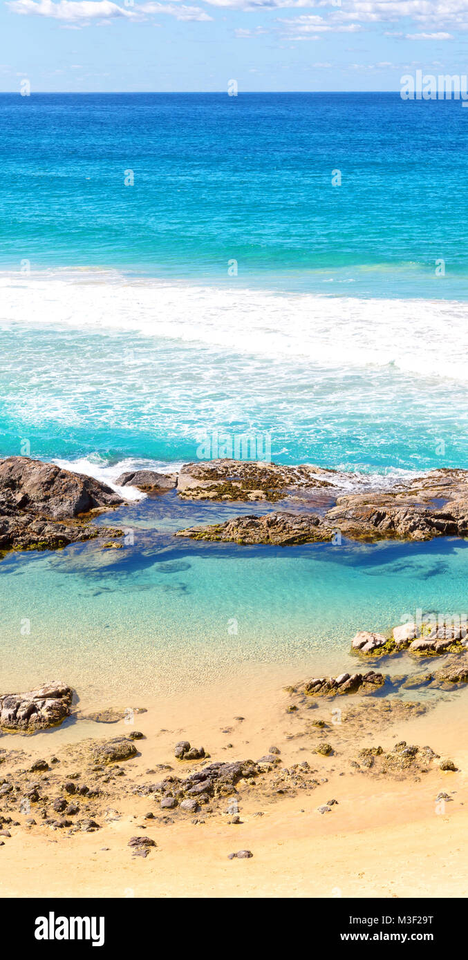in australia fraser island the beach near the rocks in the wave of ...