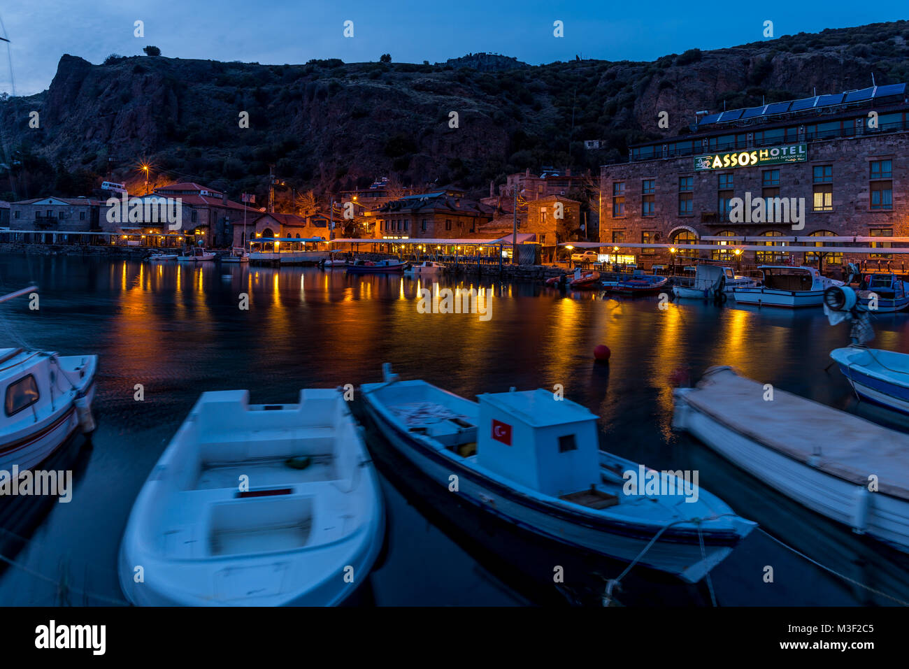 Night view at Assos harbor, Behramkale, Canakkale Stock Photo - Alamy