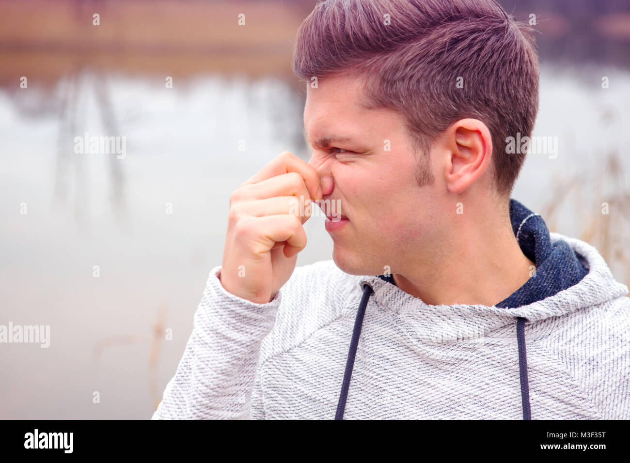 Smelling smelly stink hi-res stock photography and images - Alamy