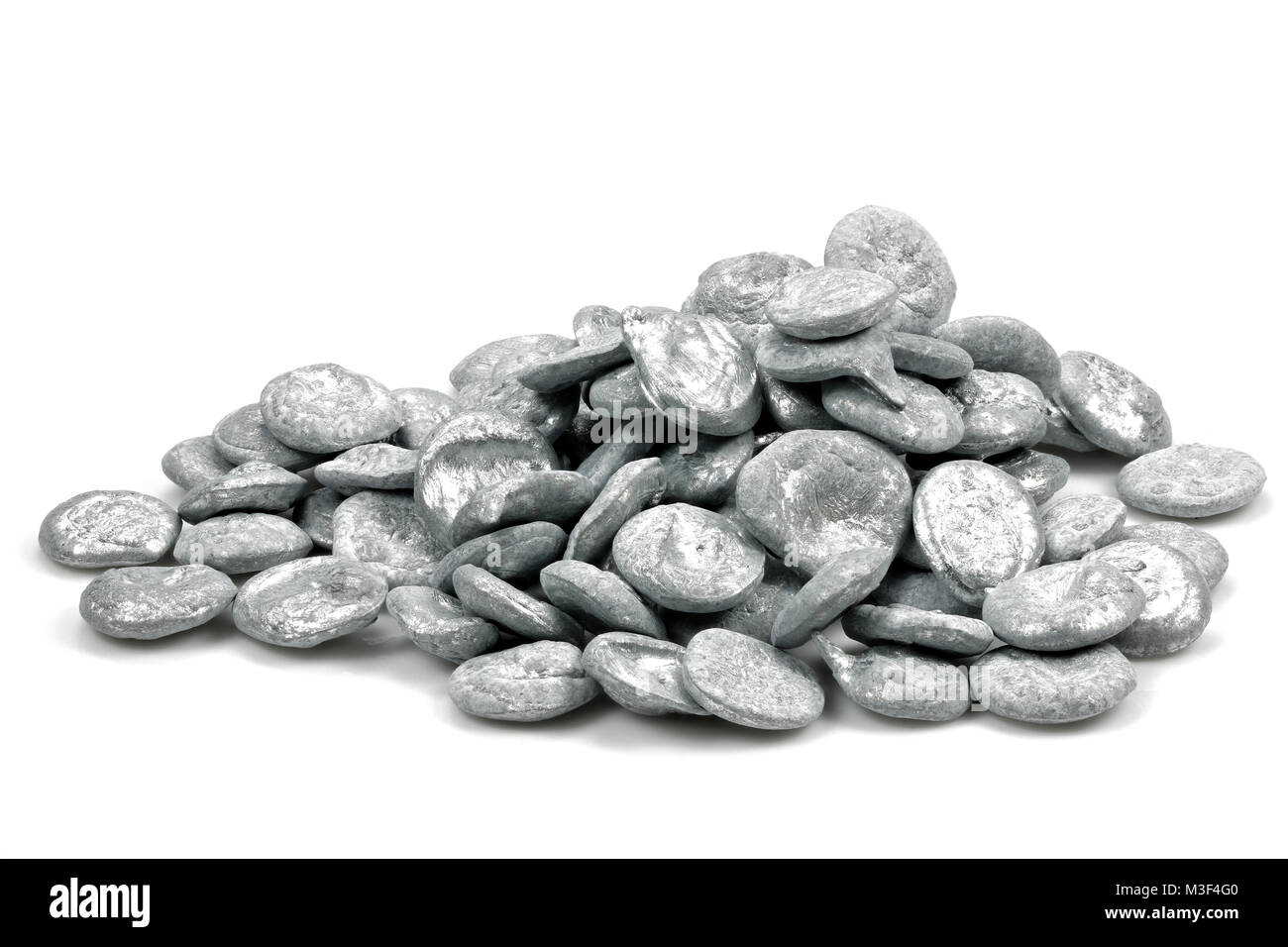 99.999% fine zinc pellets isolated on white background Stock Photo - Alamy