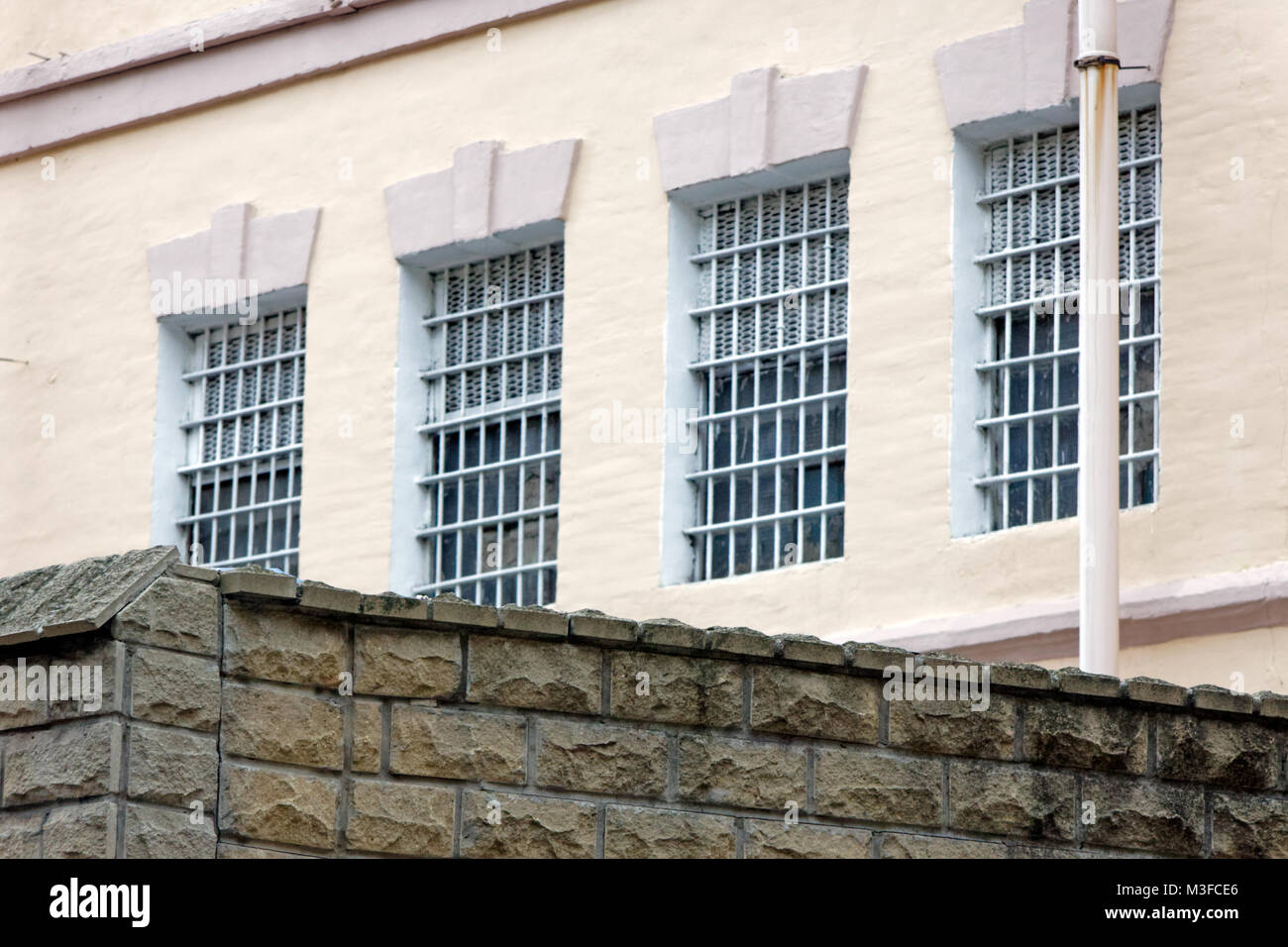 A look at the prison building from the outside. Metal lattice on ...