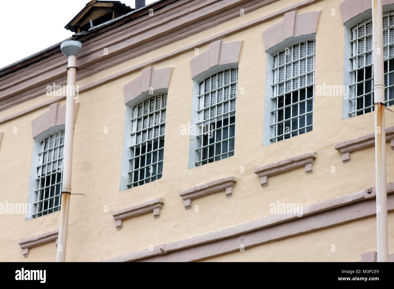 A look at the prison building from the outside. Metal lattice on ...