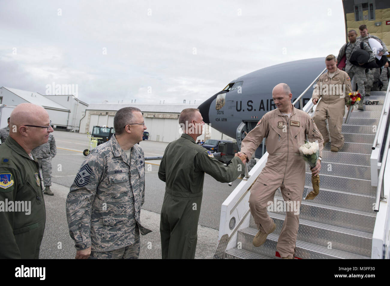 Col. Larry Shaw, 434th Air Refueling Wing commander, greets Maj. Scott ...