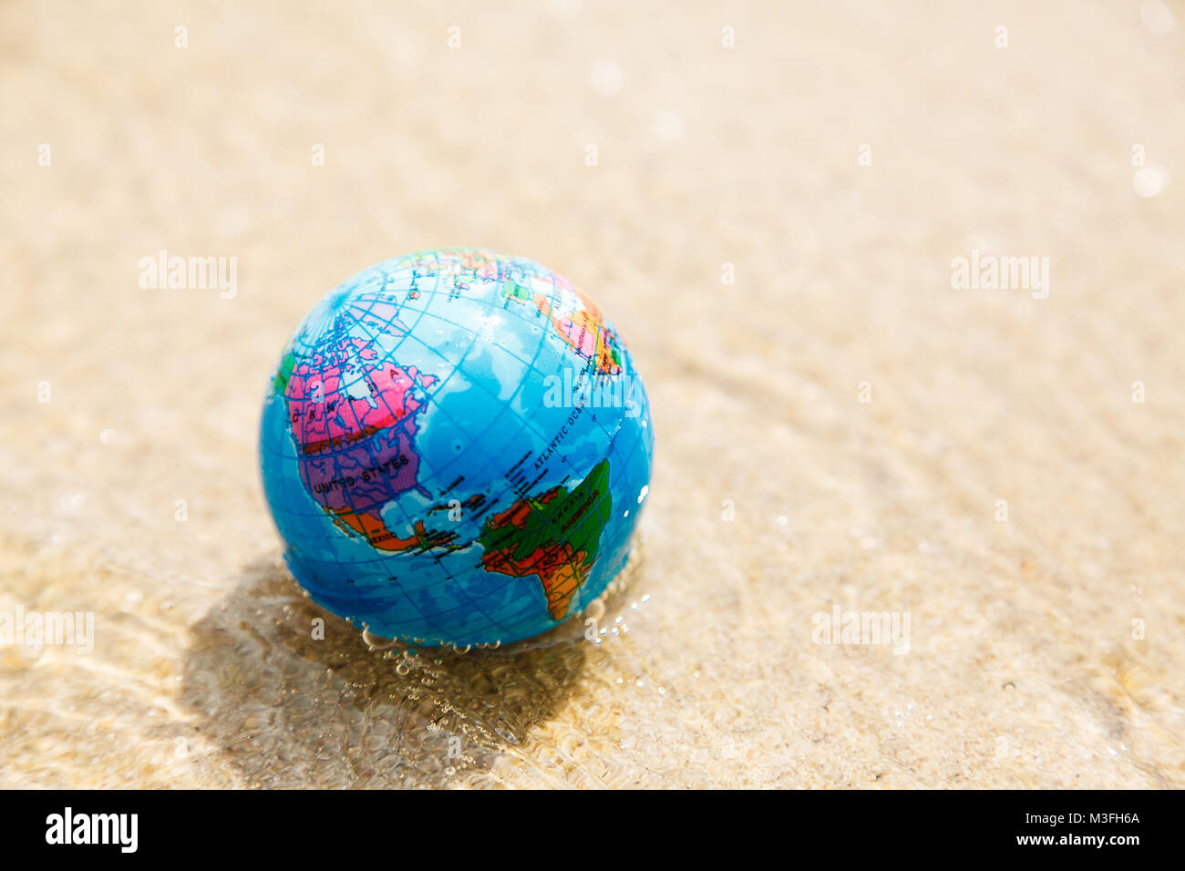 World globe beach ball hi-res stock photography and images - Alamy